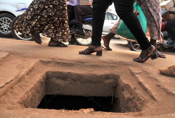 Open manholes become death traps for road users | Monitor