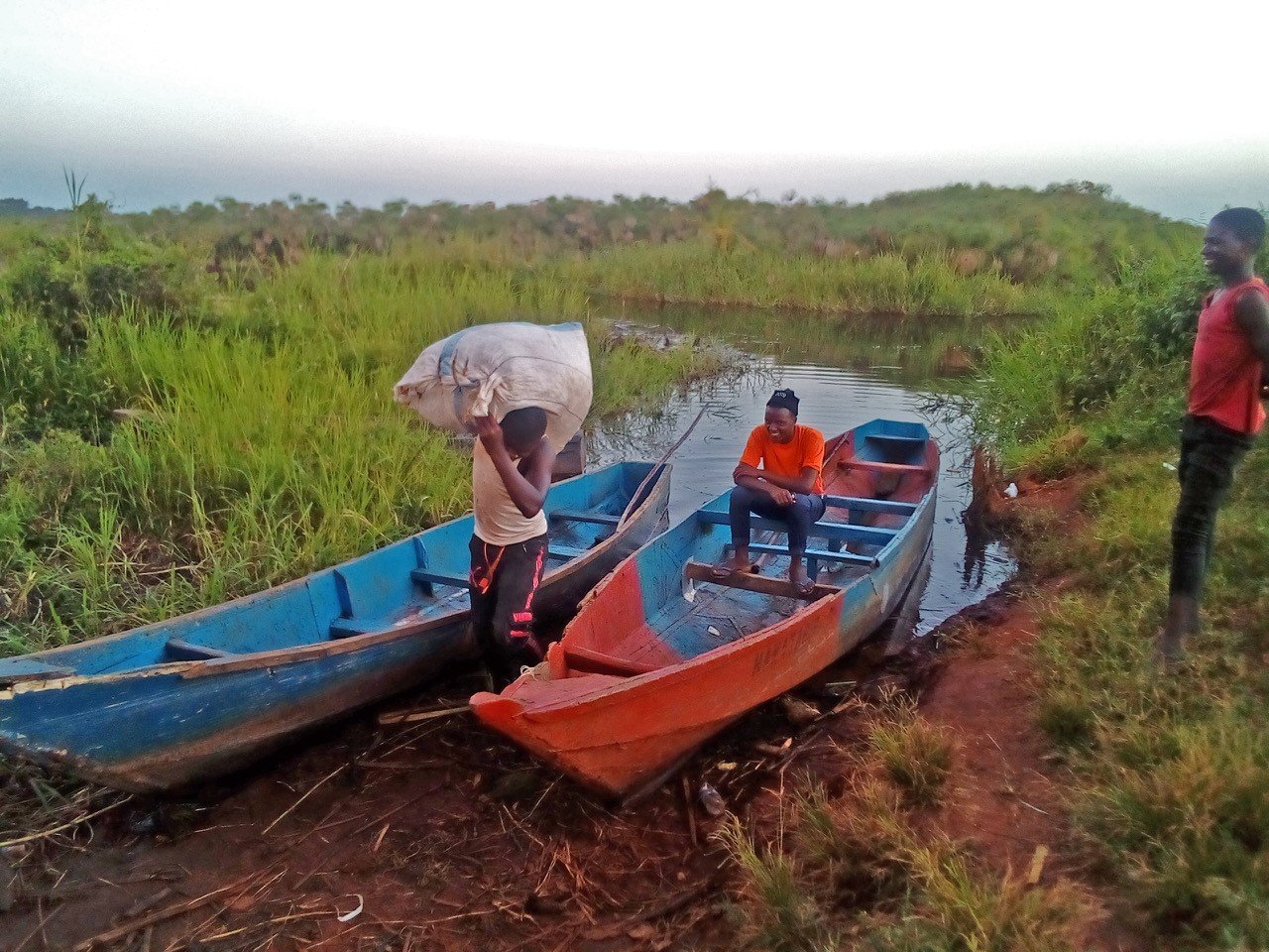 Residents dig channel in swamp to ease transport | Monitor