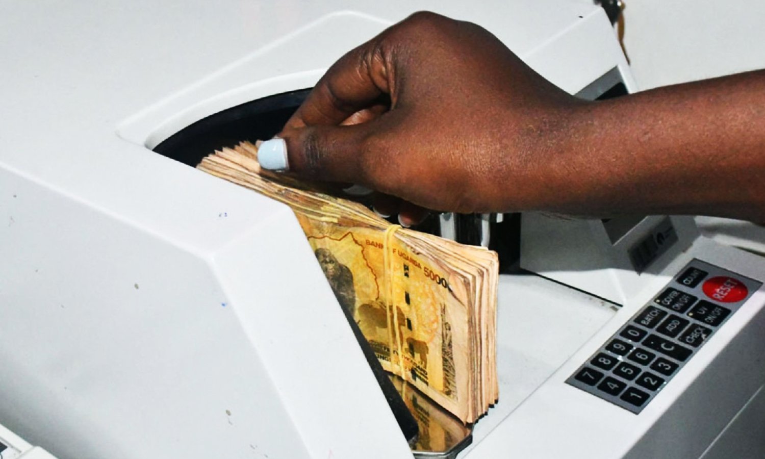 Police, PostBank probe Shs500m fake notes case | Monitor